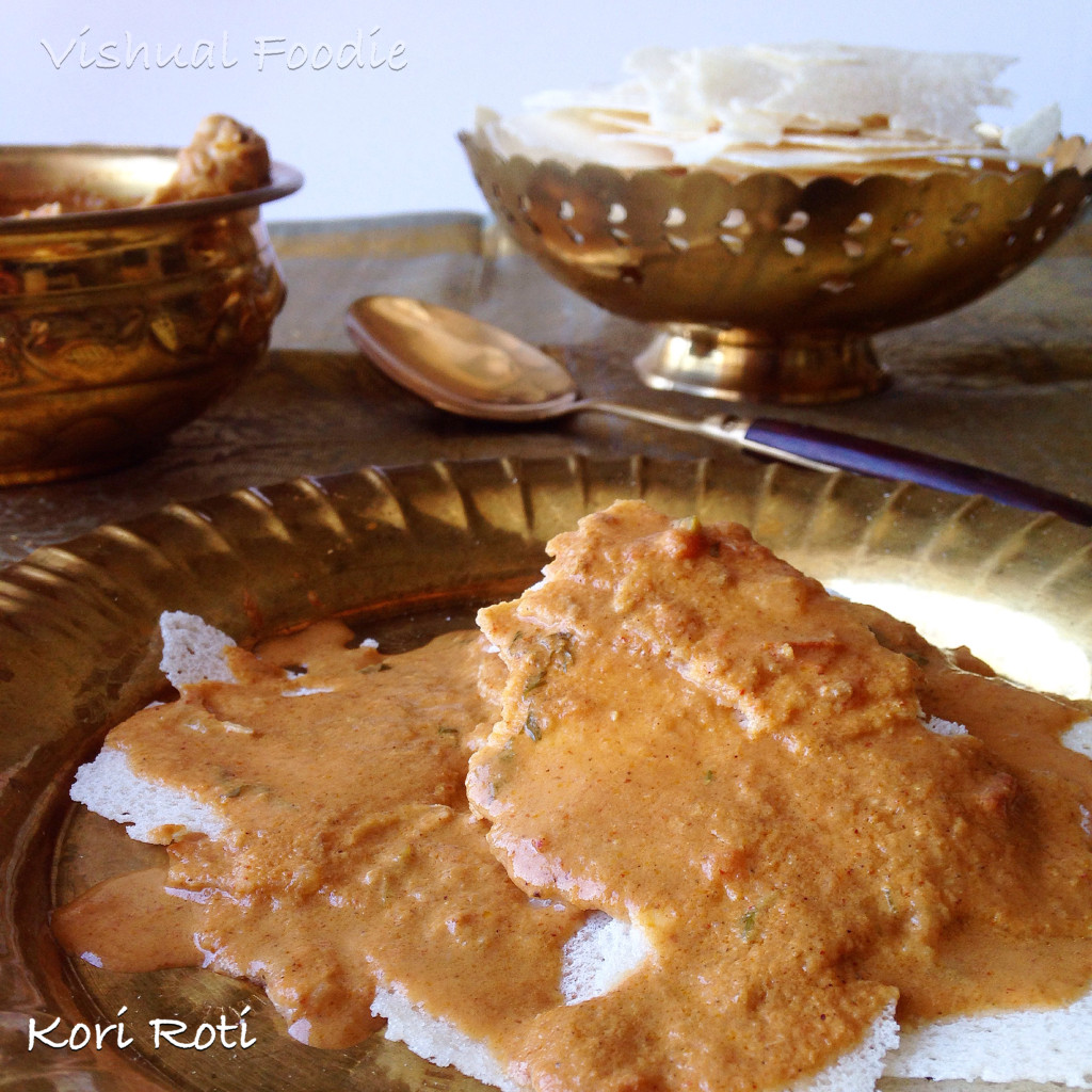 Kori Roti (Chicken curry over Rice crisps)