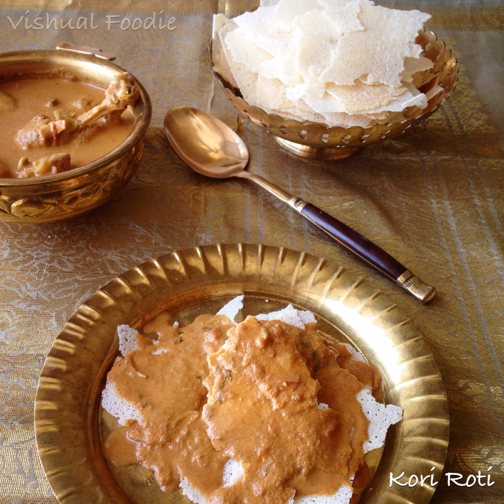 Kori Roti (Chicken curry over Rice crisps)