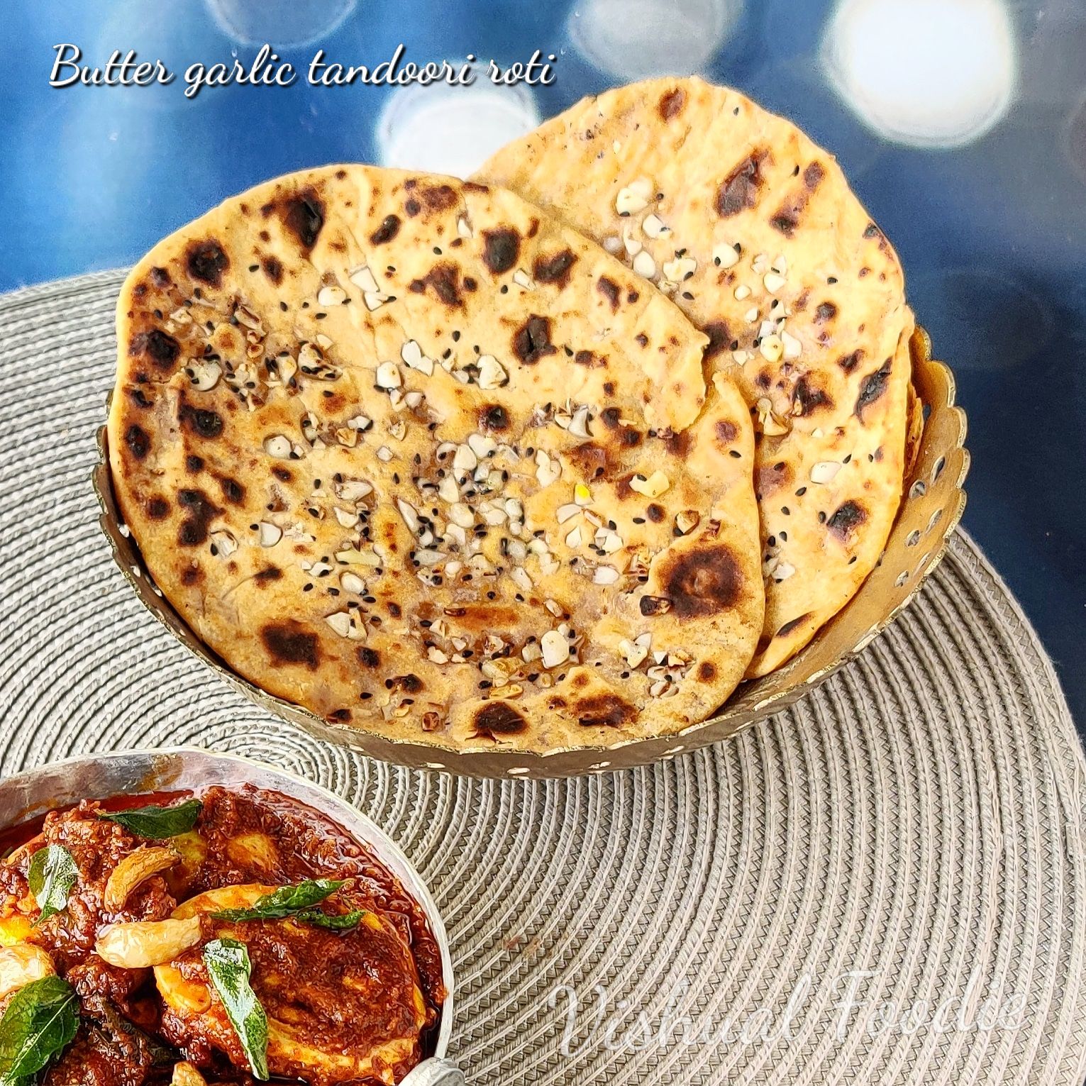 Egg Podi Ghee Roast with Tandoori Butter Garlic Roti